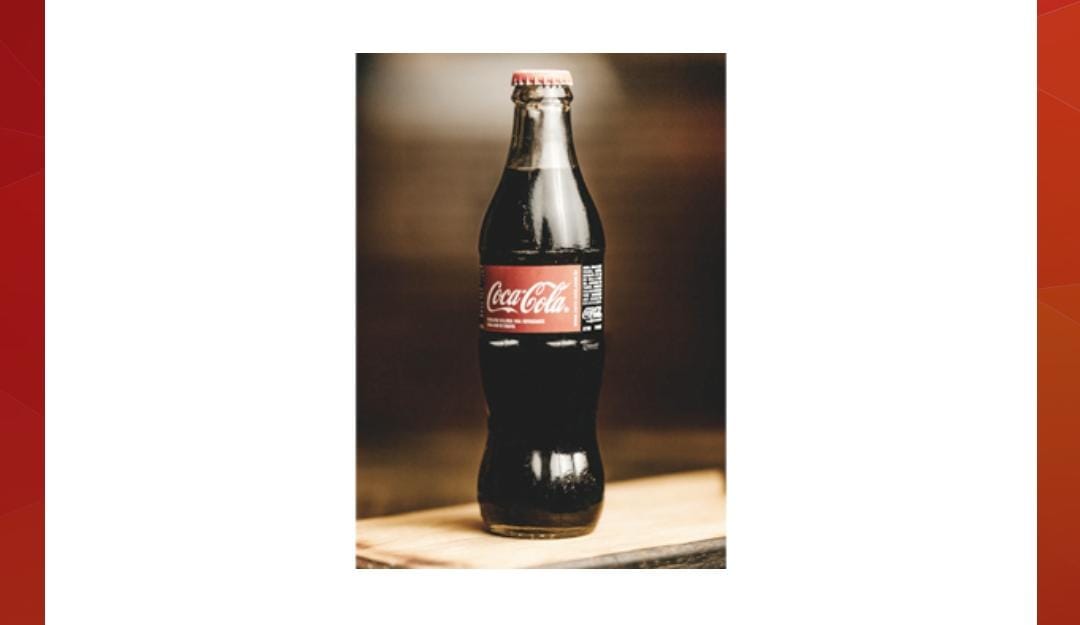 Complete the tagline for this beverage from 2000 – “Coca cola ...